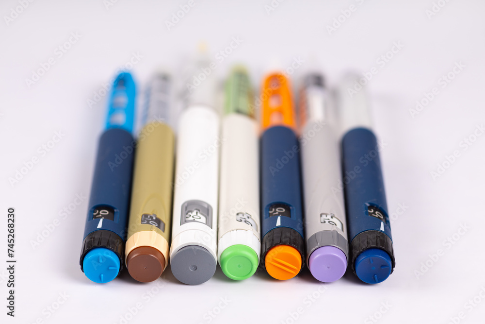 Insulin pens. Isolated on white background. Insulin injector pens for ...