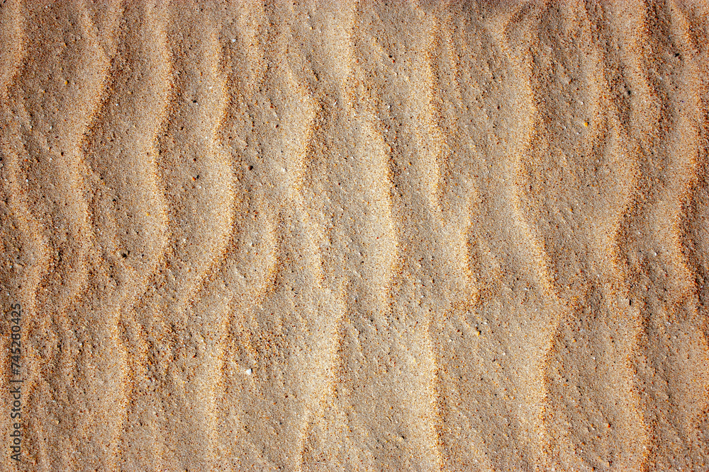 Waves on the surface of the sand, top view. The wavy surface of coastal ...
