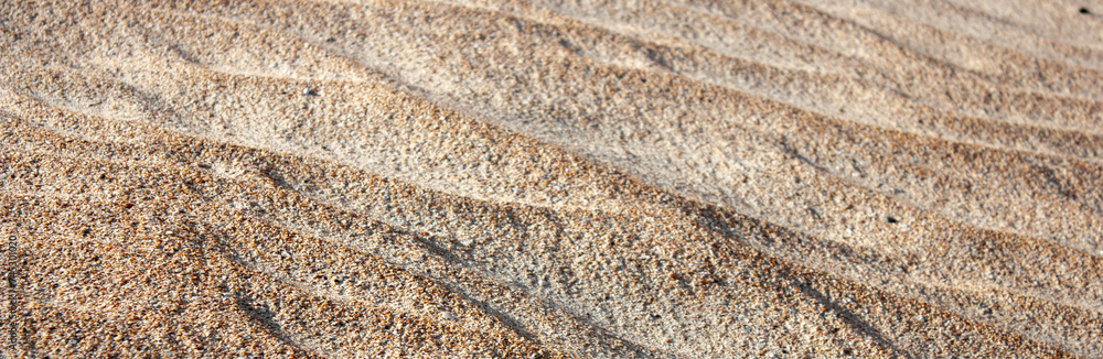 Waves on the surface of the sand, top view. The wavy surface of coastal ...