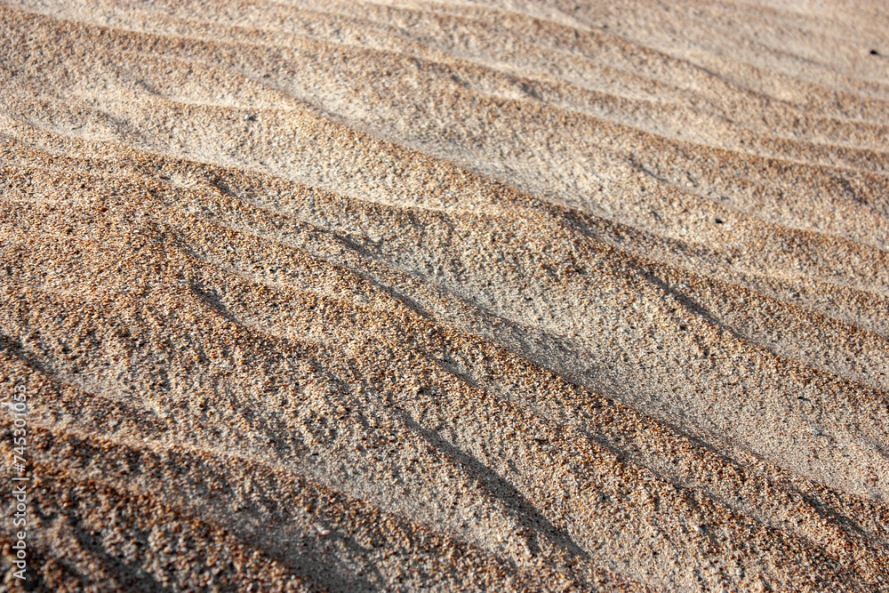 Waves on the surface of the sand, top view. The wavy surface of coastal ...