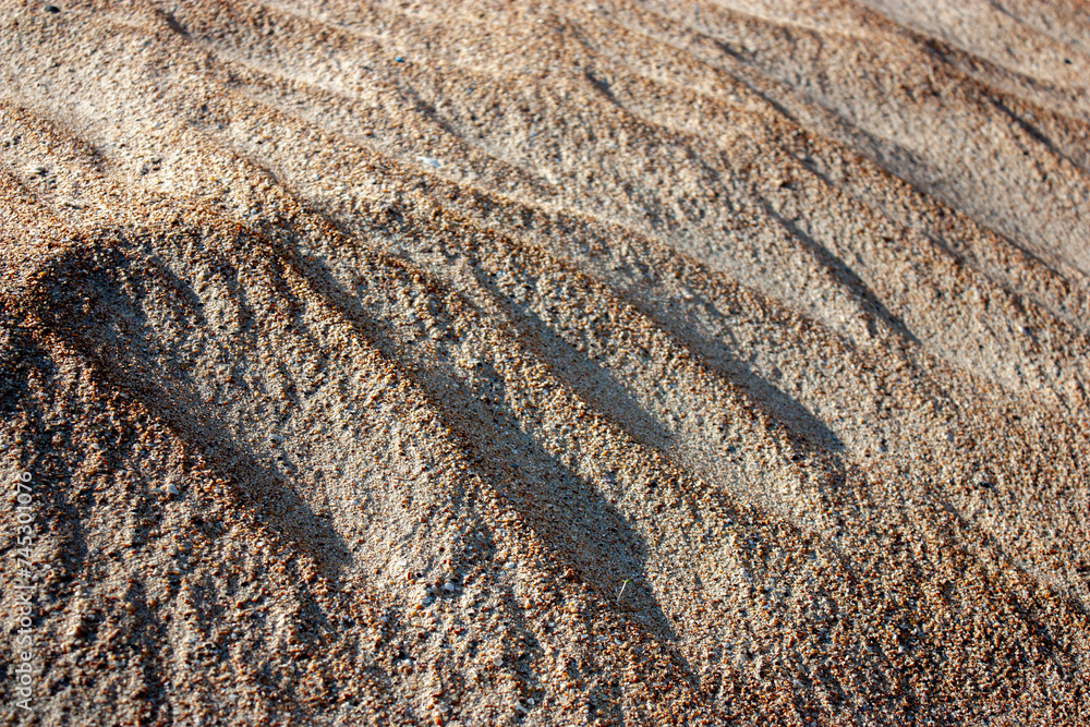 Waves on the surface of the sand, top view. The wavy surface of coastal ...