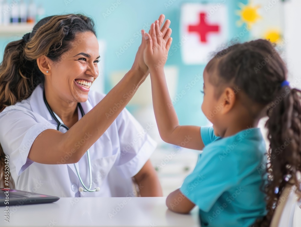 Capturing a touching interaction, a female doctor shares a smile and ...
