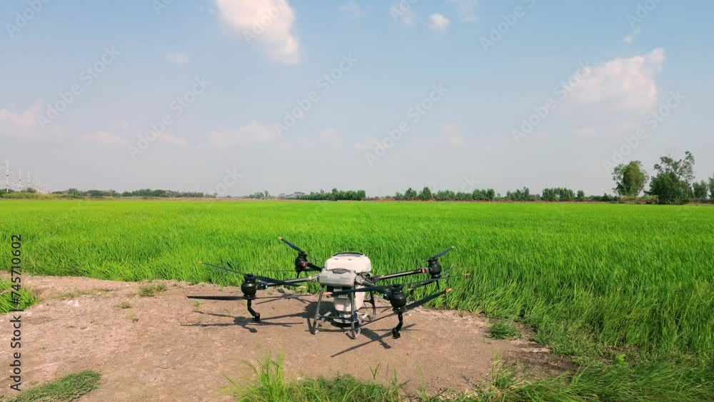 Modern technologies in agriculture. Agriculture drone fly to sprayed ...