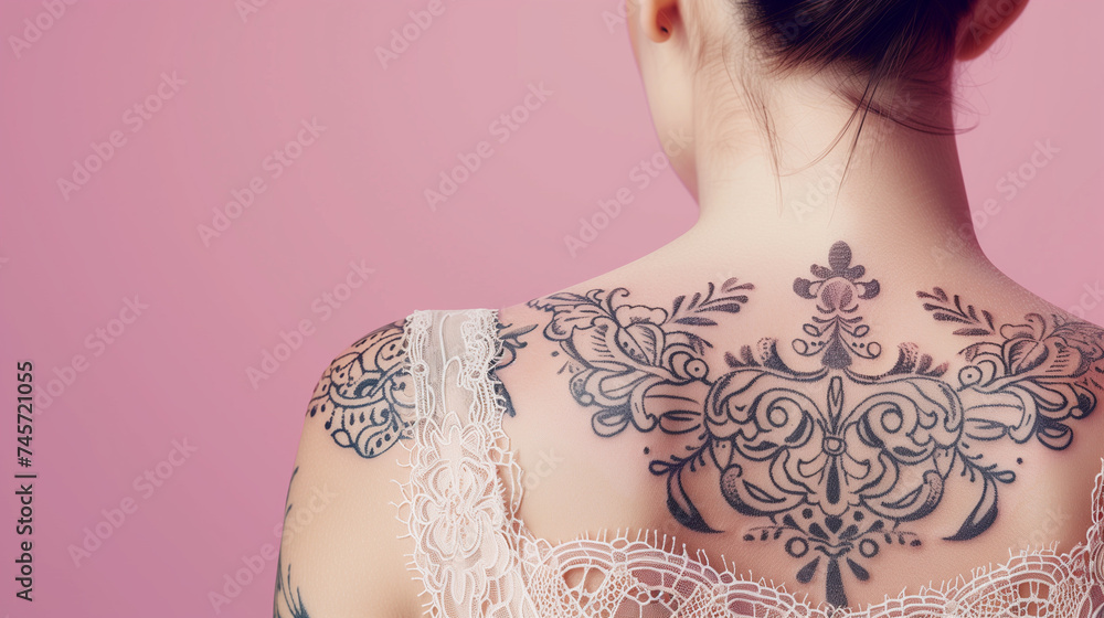 A detailed UHD capture of a woman's back tattoo featuring an intricate ...