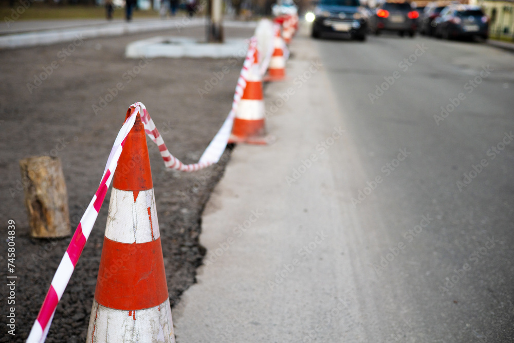 Under construction board sign on the closed road with arrow sign and ...