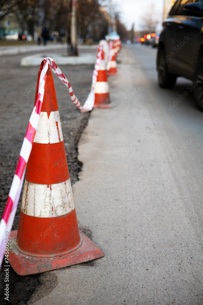 Under construction board sign on the closed road with arrow sign and ...