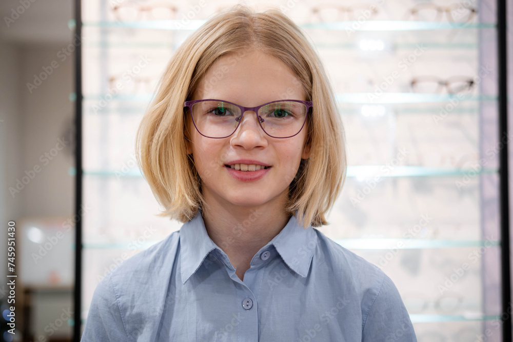 portrait happy little girl patient ophthalmology clinic, vision test in ...