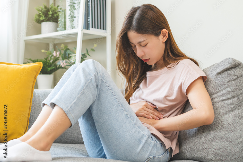 Flatulence asian young woman intolerance hand in stomach ache, suffer ...