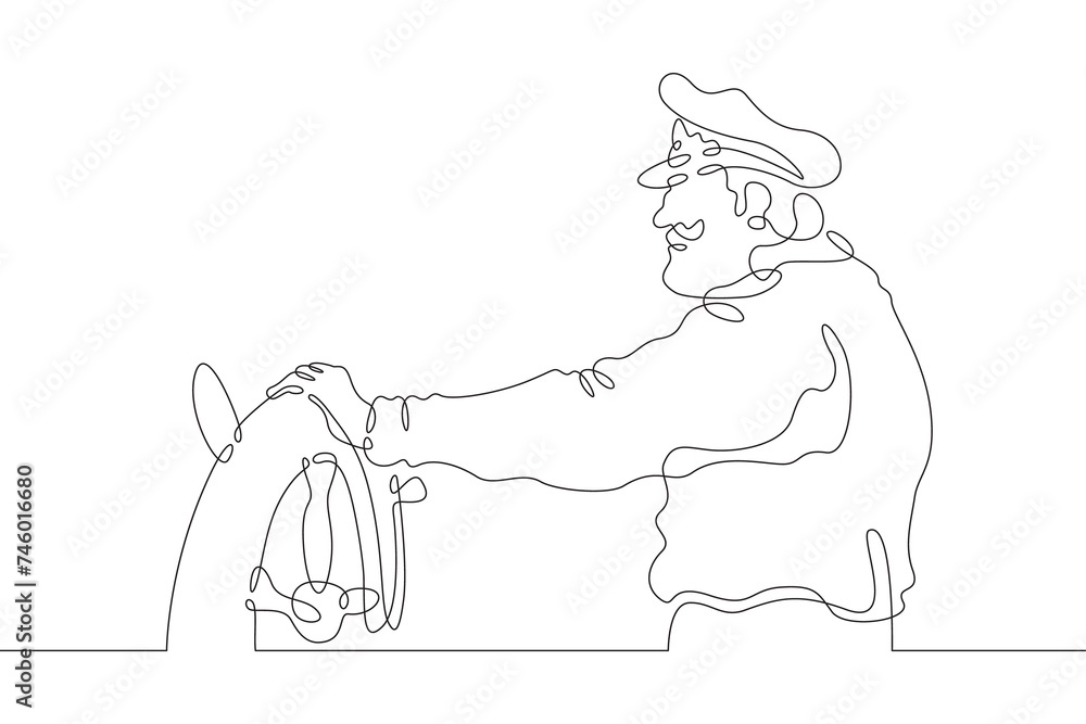 The ship's captain is at the helm. An officer controls a sea vessel. A ...