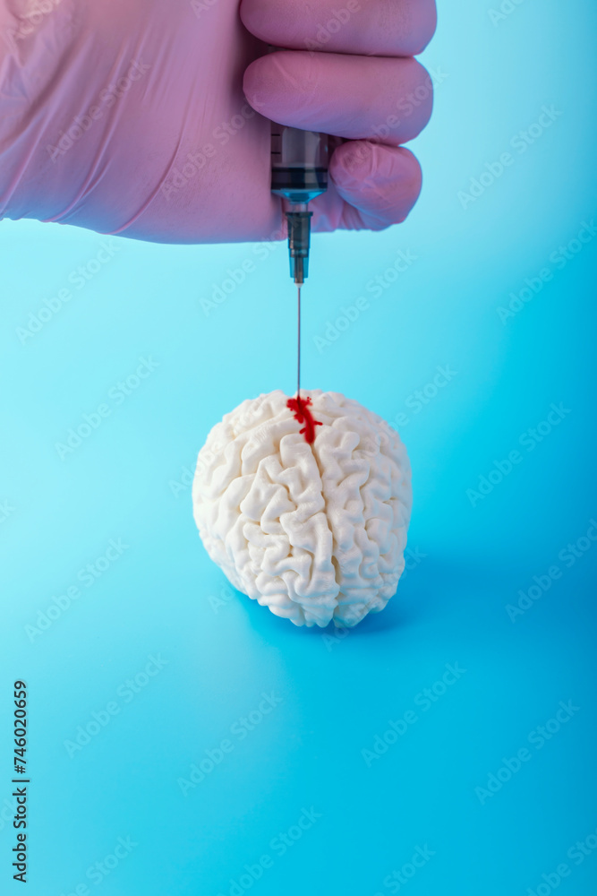Concept experiments on human brain syringe with red drop of blood Stock ...