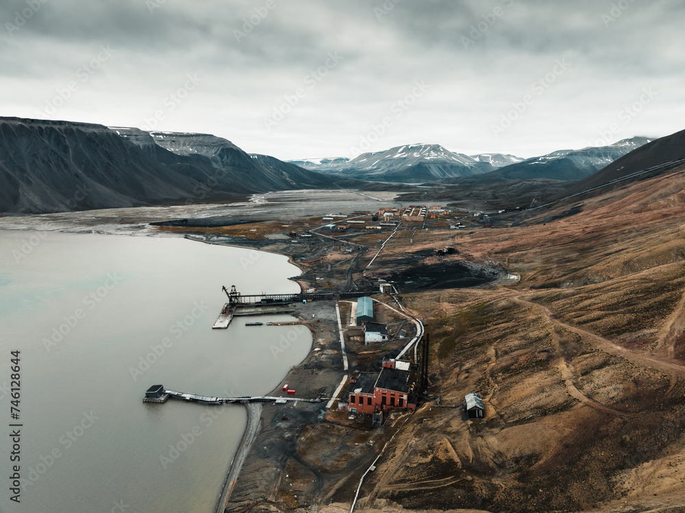 drone shot of Pyramiden, which is an abandoned Soviet coal mining ...