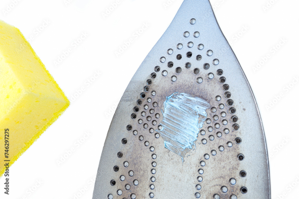 Burnt dirty electric flat iron. Clean an base surface with Toothpaste ...