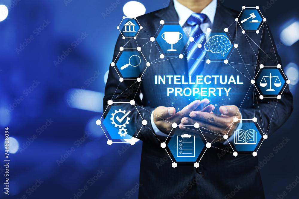 Foto de Intellectual property concept with businessman show the right ...