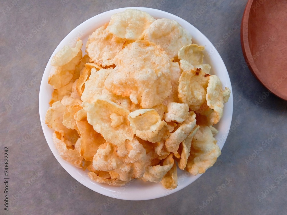 bowl of cereal. Kerupuk emping, emping or crackers made from melinjo ...