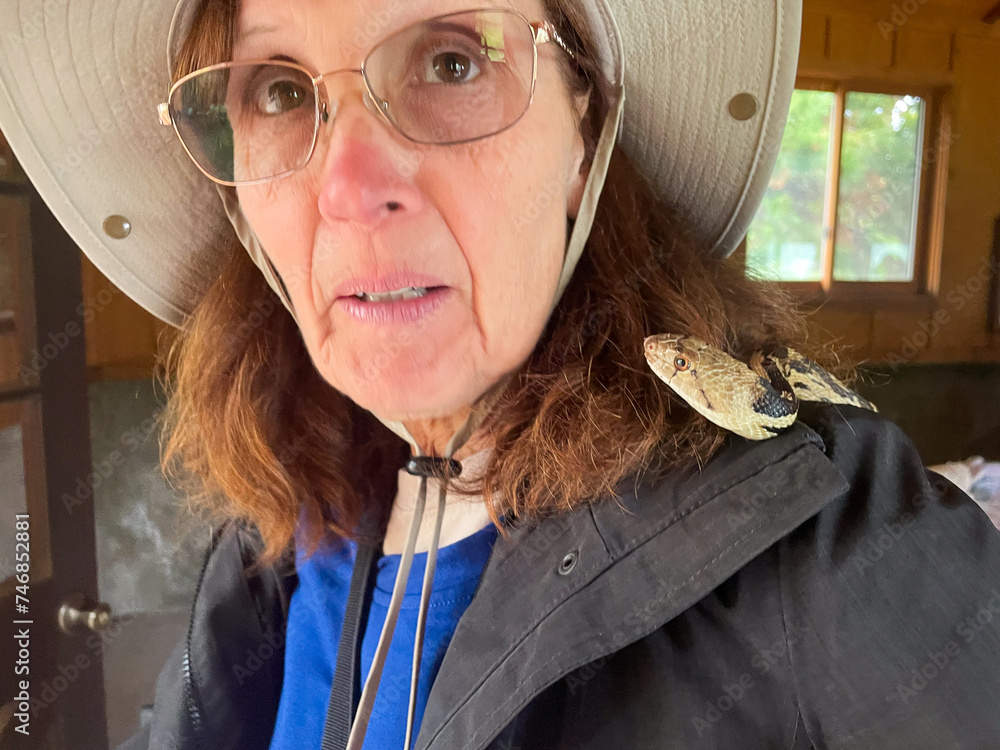A Mature Woman Naturalist Experiencing a Gopher Snake for the First ...