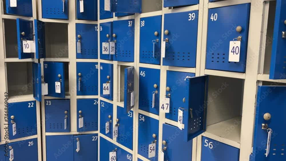 Rows of metal storage lockers in a supermarket, school, college ...