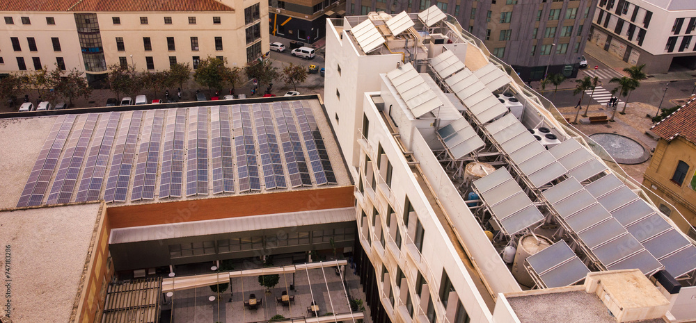 Solar Panel Roof Multifamily Apartment Building on Cityscape Backgroung ...