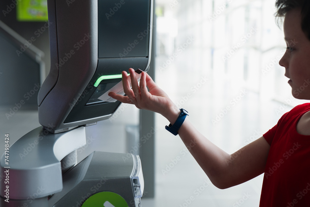 Child Scanning Ticket at Science Museum Entrance Stock Photo | Adobe Stock