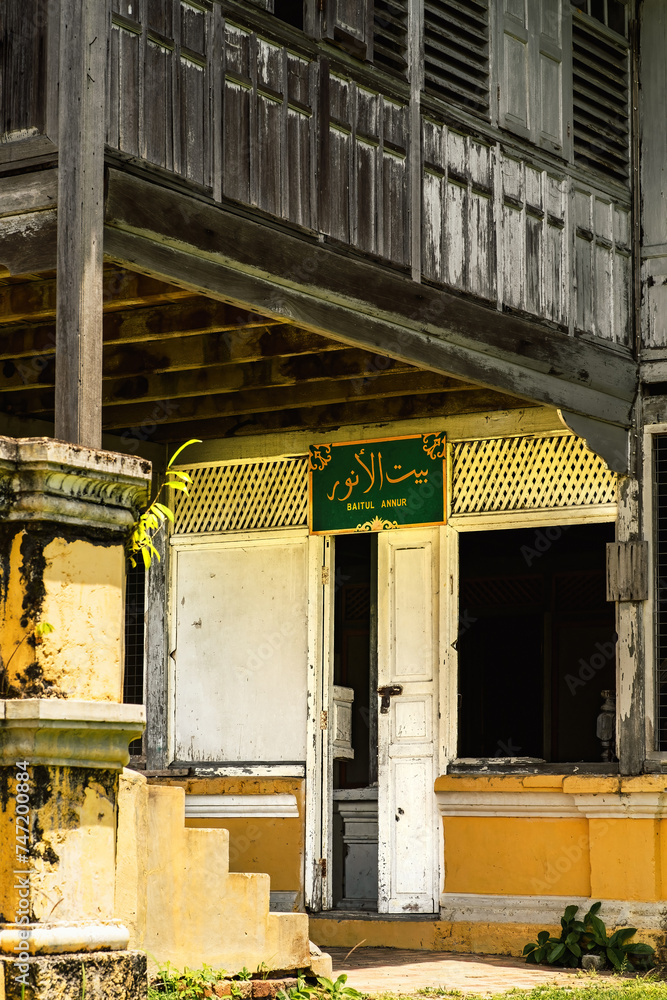 Perak, Malaysia - Oct 18, 2022 Old weathered wooden house built in 1912 ...