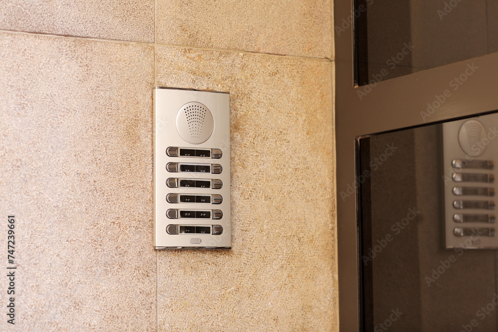 Outdoor intercom outside a residential building with empty name tag ...