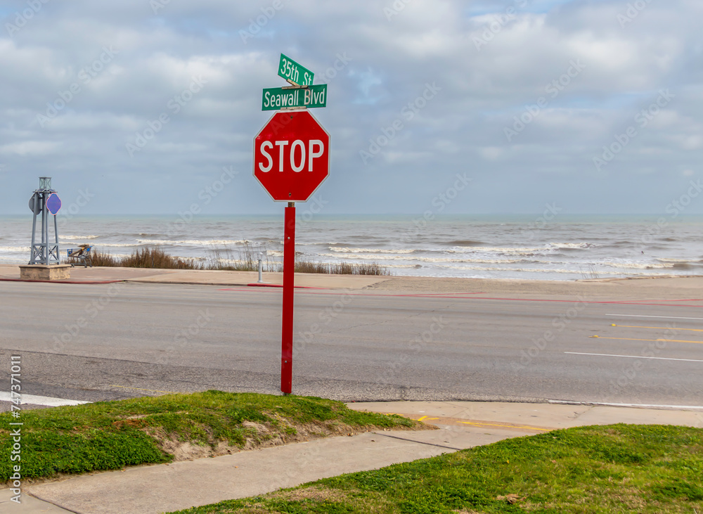 Stop sign on the beach. Intersection of Seawall Blvd. and 35th Street ...