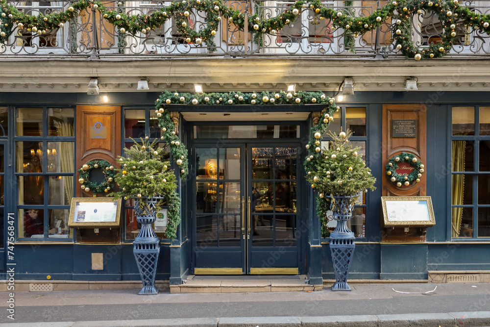 Paris France , 9 june 2023 : typical french storefront , falous and ...