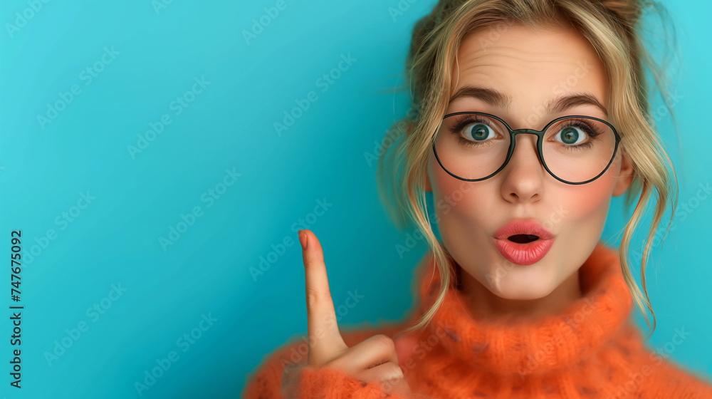 A lively girl points to a vibrant banner for expressive ads. Her ...