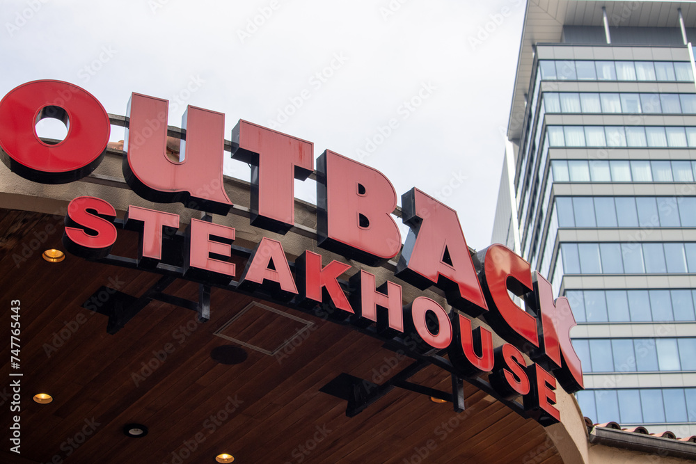 Tokyo, Japan, November 4 2023: Outback Steakhouse Signage with Modern ...