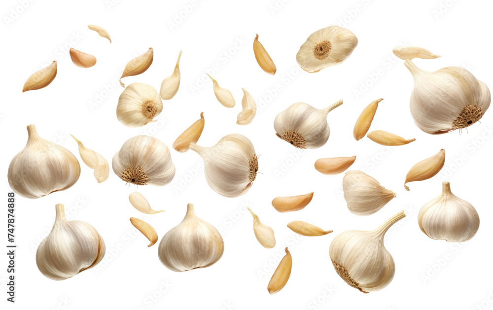 Bunch of Garlic. A grouping of garlic bulbs is neatly arranged on a ...