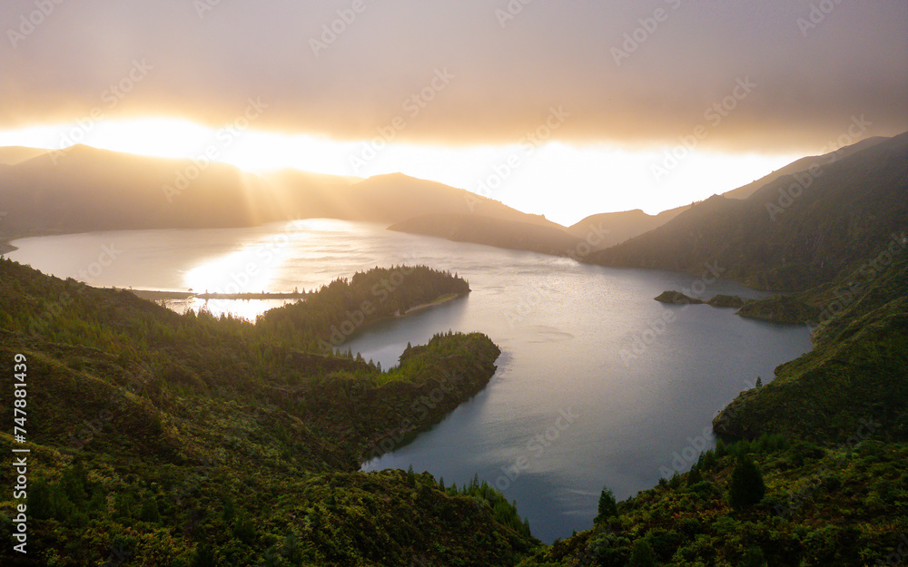 Beautiful panoramic during sunrise view of Lagoa do Fogo lake in Sao ...