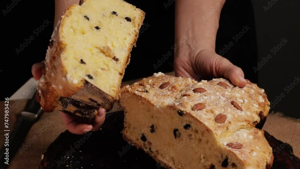 COLOMBA cake is a traditional Italian Easter dessert. The chef breaks ...