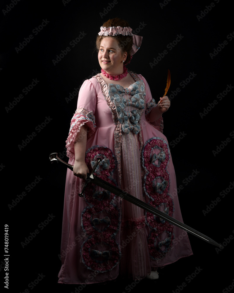 portrait of female model wearing an opulent pink gown, costume of a ...