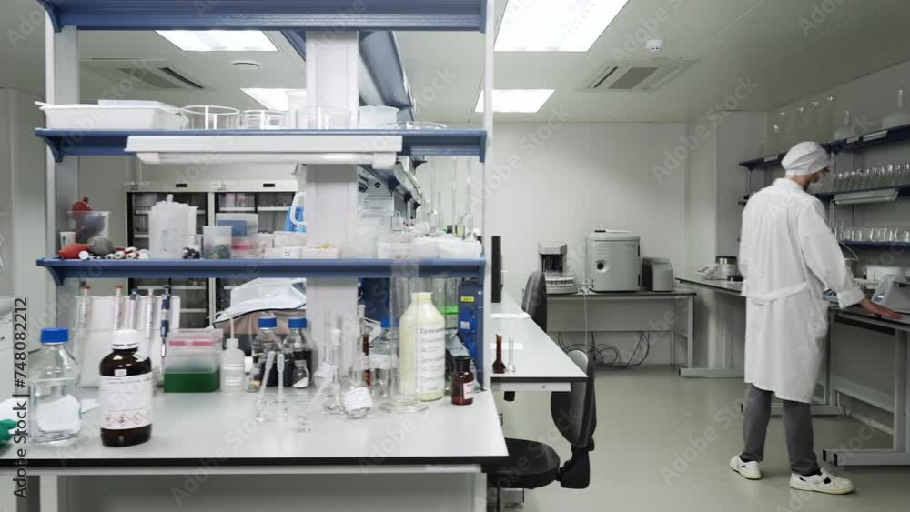 Panoramic View Of A Well-Equipped Laboratory. Technicians In Uniform ...
