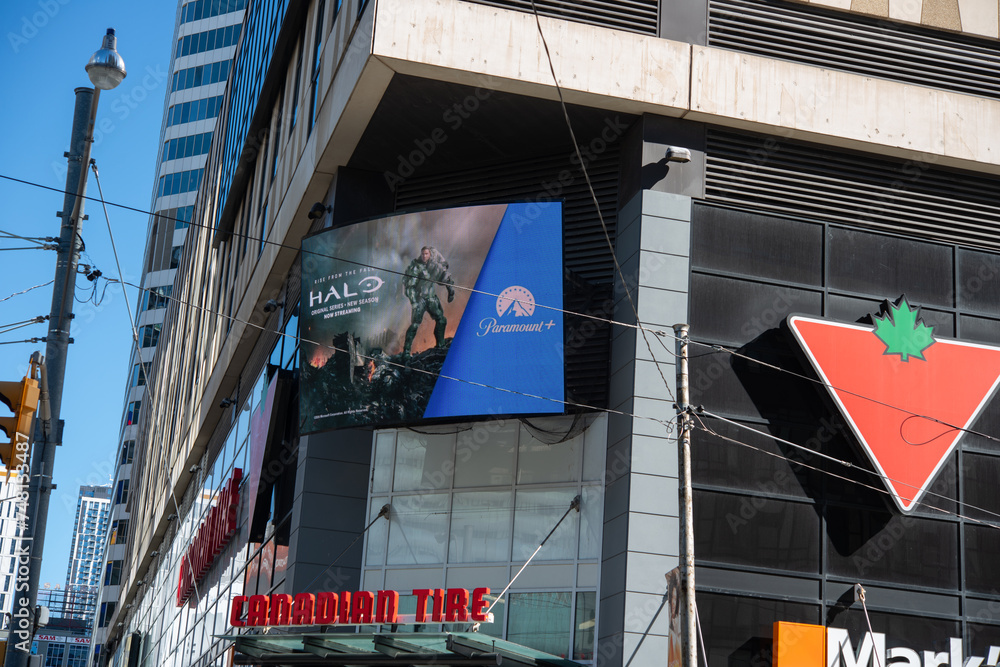 exterior building facade and sign of Canadian Tire, a ubiquitous ...