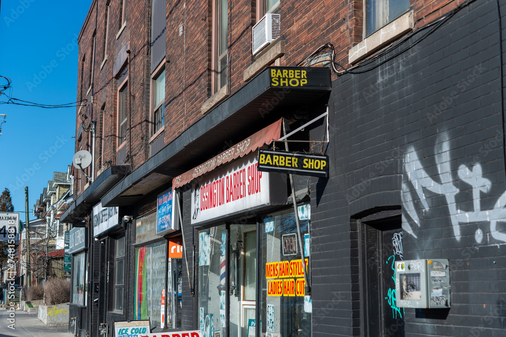 exterior building facades including Ossington Barber Shop located at ...