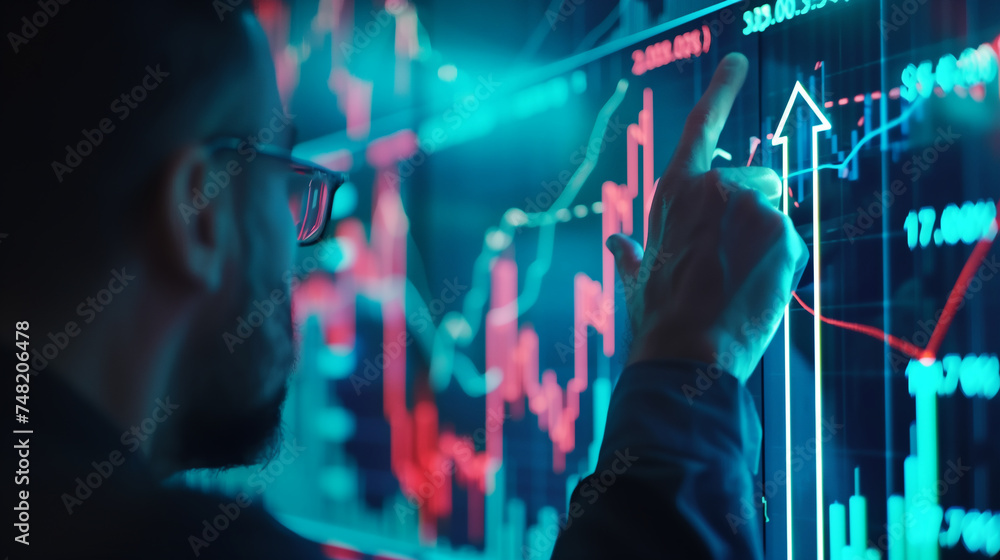 Close-up of an analyst with glasses pointing at a rising trend line on ...