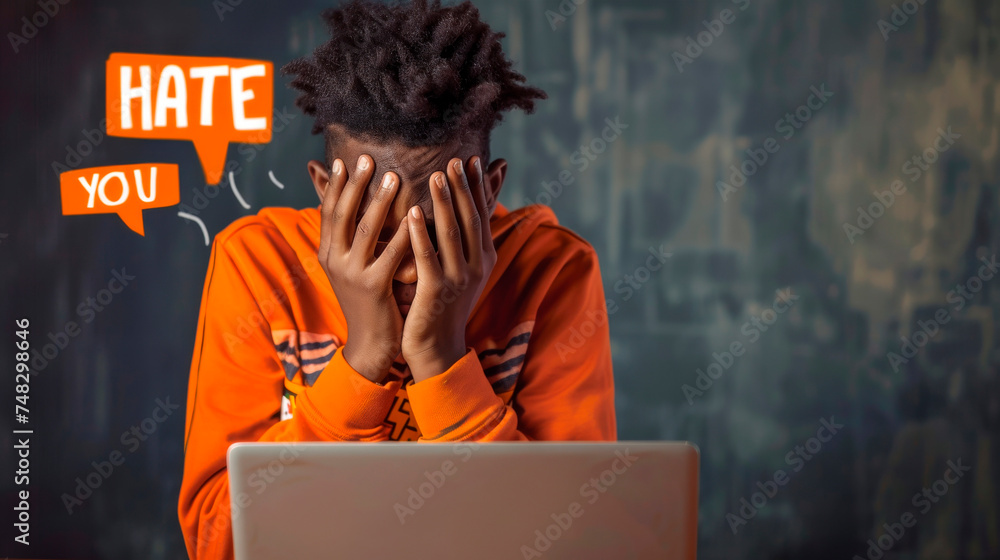 Upset student experiencing cyberbullying on a laptop. Distressed teen ...