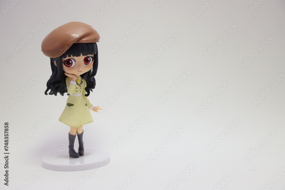 Young chibi style doll dressed in a beret, long jacket and leather ...