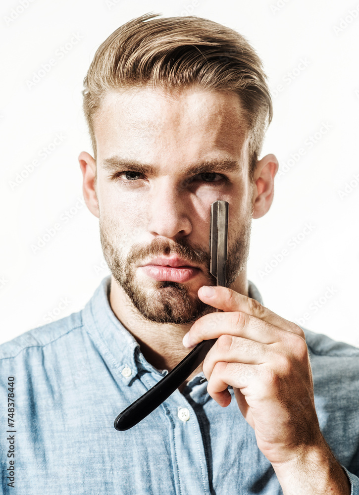 Barbershop. Closeup portrait of stylish bearded man with straight razor ...