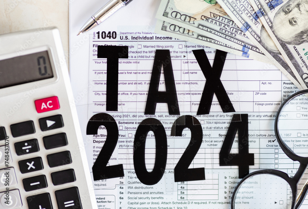 Individual income tax return form for tax payment on working desk ...