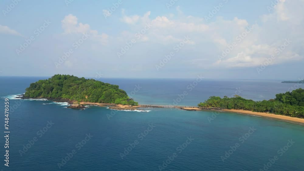 Aerial view of the bridge that connects Ilheu Bom Bom to Bom Bom beach ...