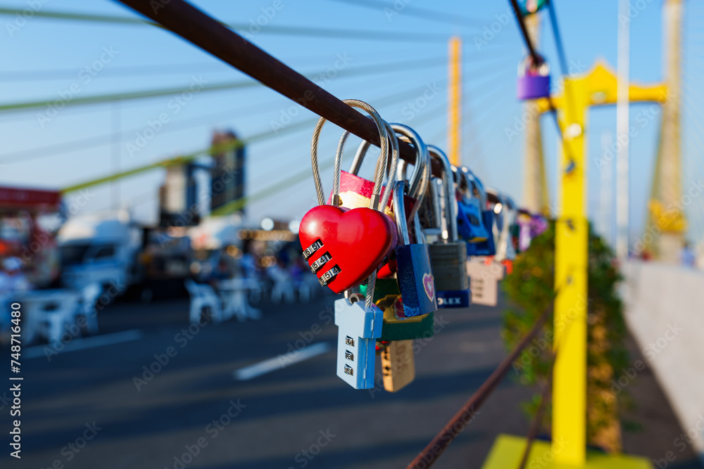 Love locks hanging on parallel bridge to Rama 9 Bridge Chao Phraya ...