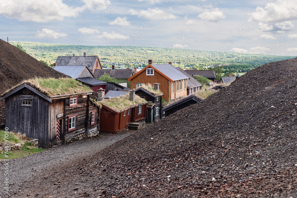 The rustic charm of Roros is evident in its traditional wooden ...