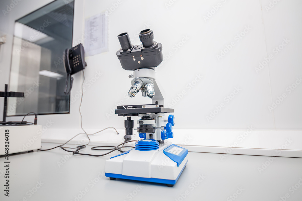 An isolated Compound Microscope in a science laboratory for research ...