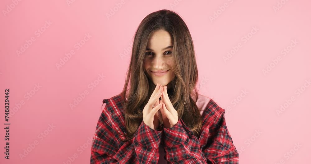 Mysterious sly woman steeple fingers and schemes something tries to ...