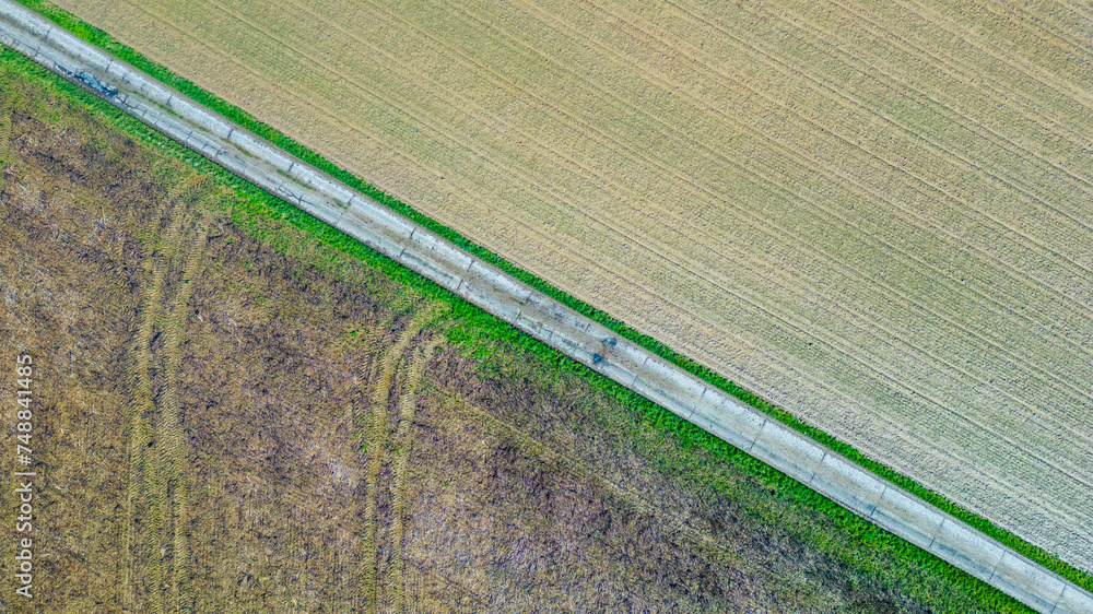 This image showcases an aerial view of an agricultural landscape, where ...