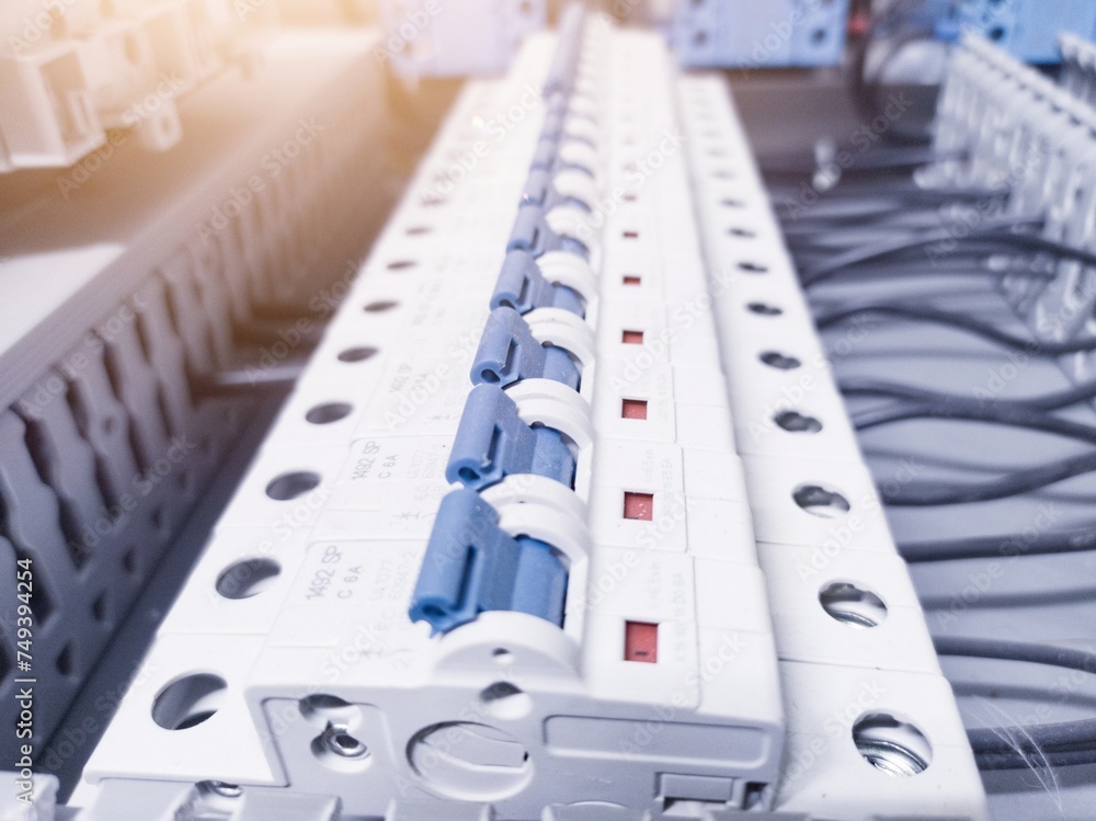 Voltage switchboard with circuit breakers on the panel board. Wire ...