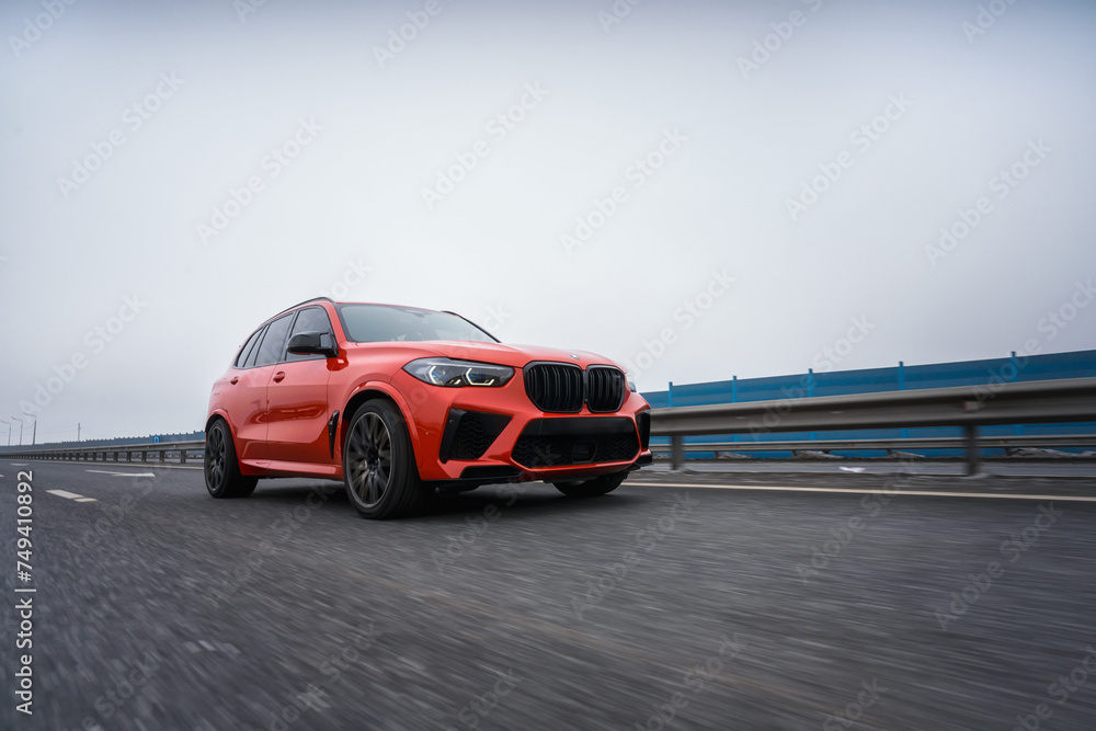 HELSINKI, FINLAND - MARCH 01, 2024: A red facelifted BMW X5 m ...