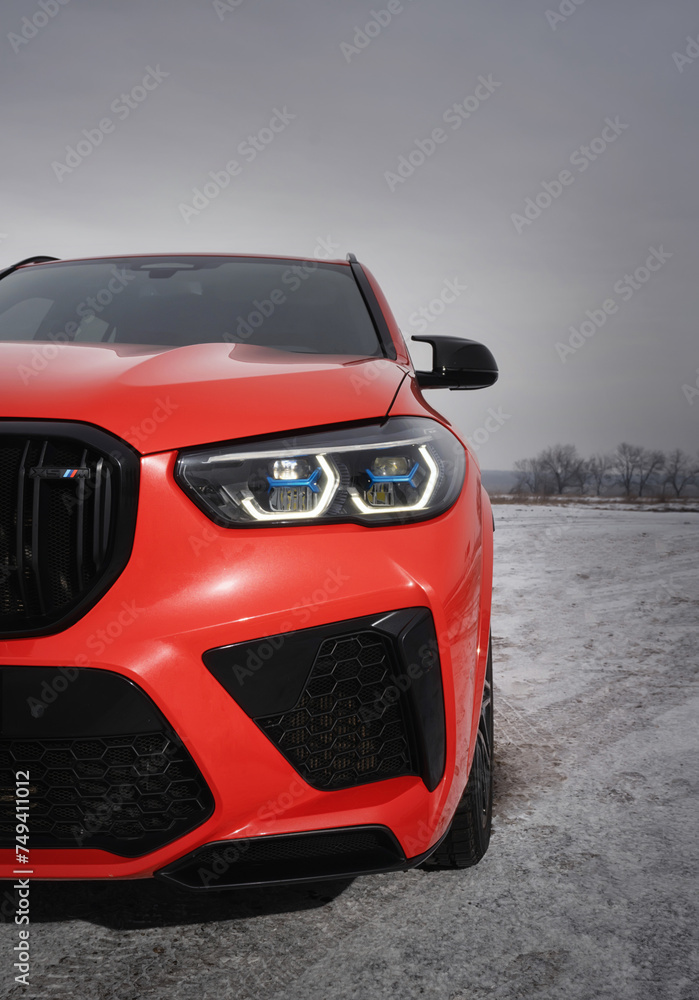 HELSINKI, FINLAND - MARCH 01, 2024: A red facelifted BMW X5 m ...