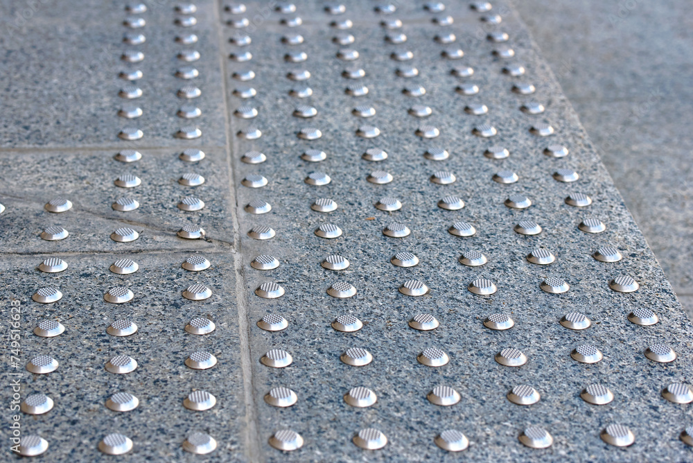 Stair step with anti-slip tactile stud system for visually impaired ...